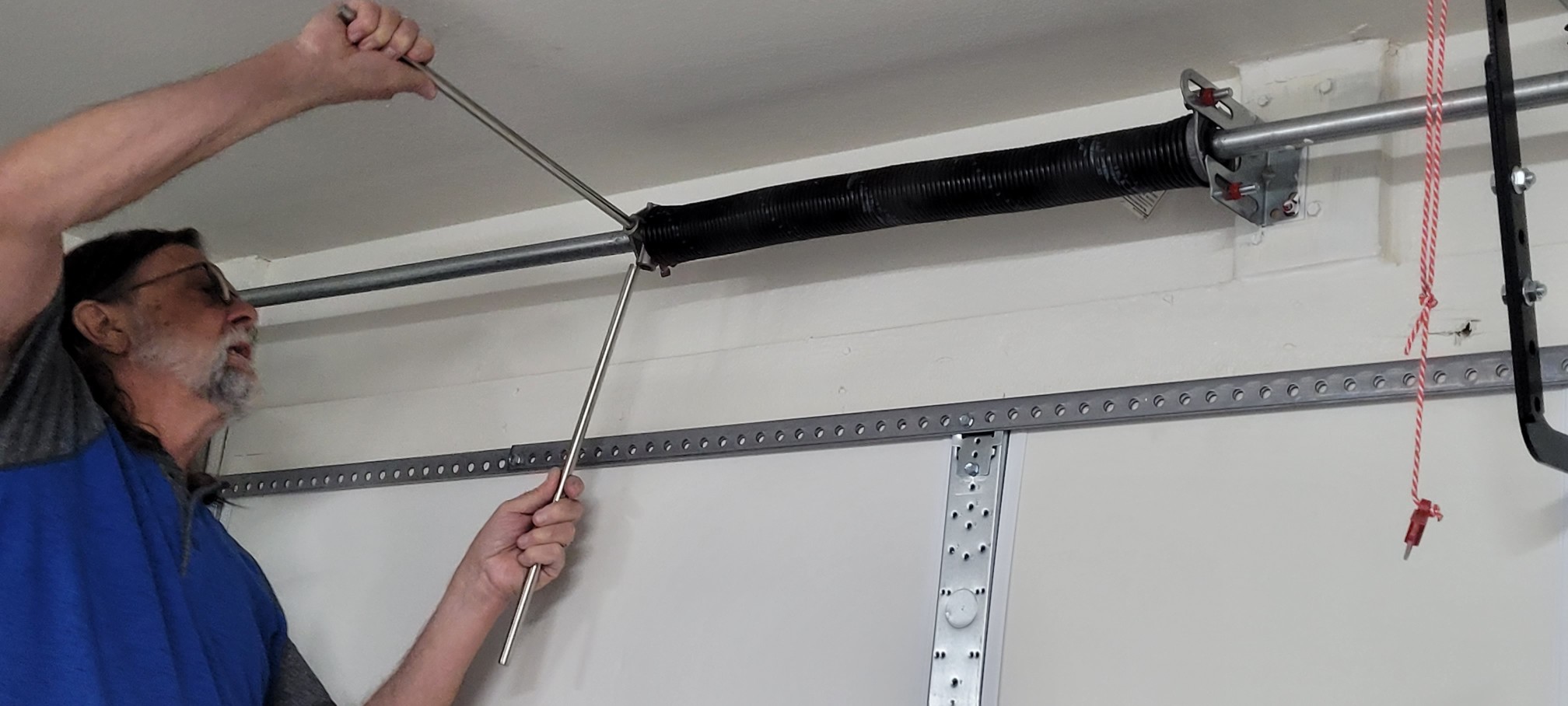 How to Fix Garage Door Torsion Spring and Cables? - Garage Door Club
